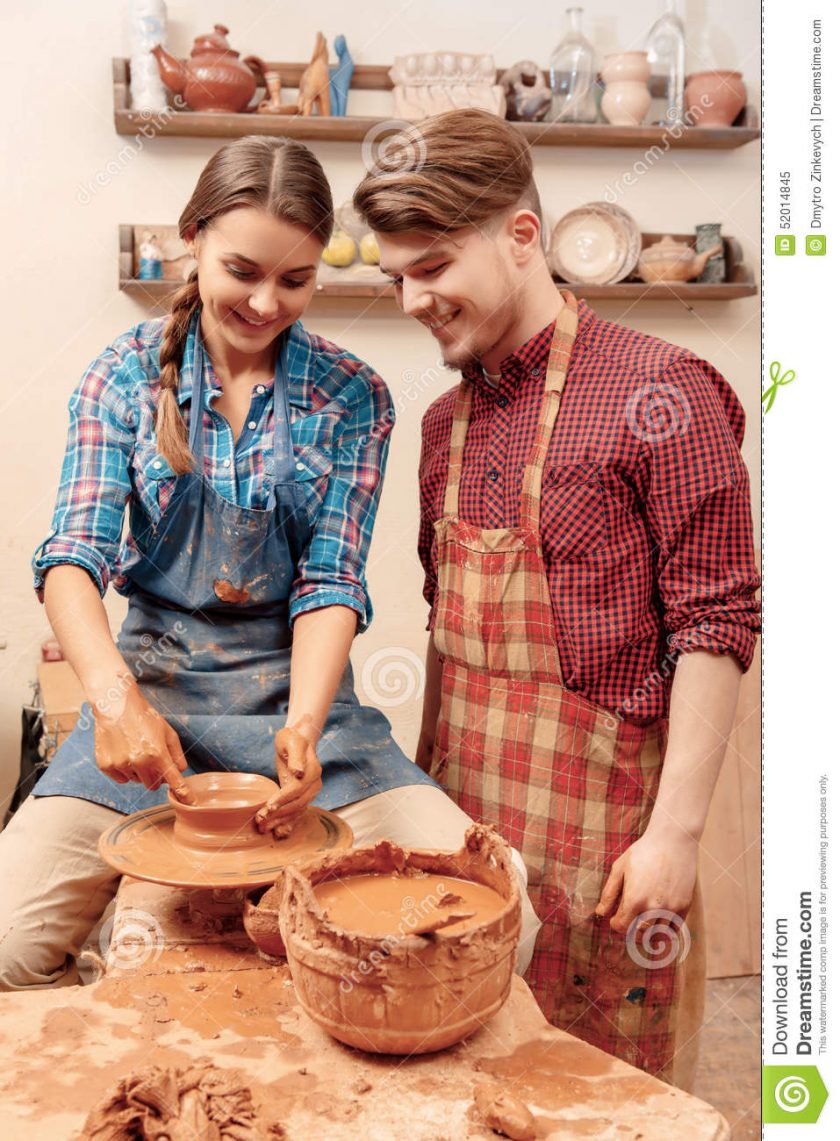 young couple on pottery wheel | Pottering Around